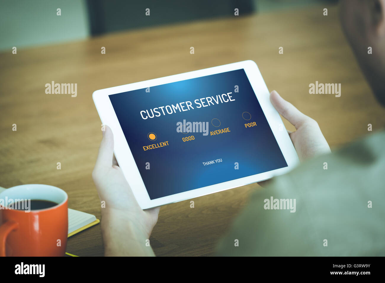 Customer service survey form app on a screen Stock Photo - Alamy
