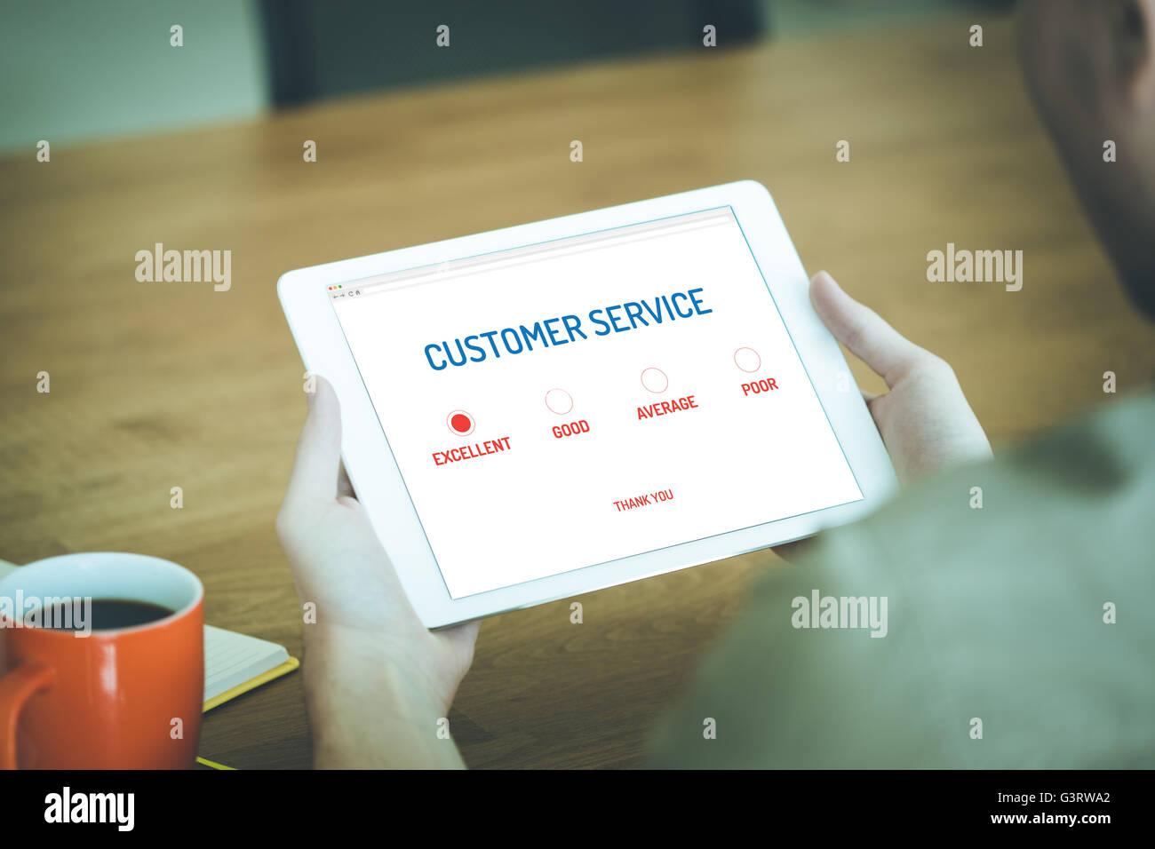 Customer service survey form app on a screen Stock Photo - Alamy