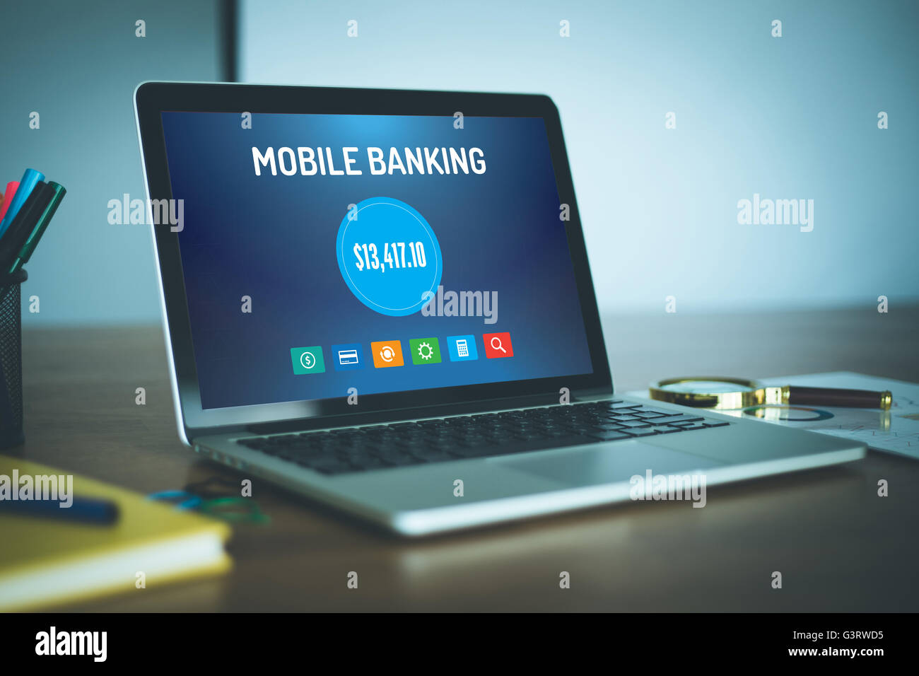 Laptop with mobile banking application on a screen Stock Photo - Alamy