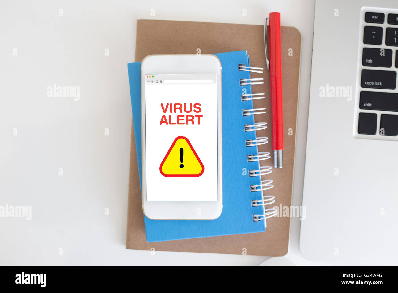 Virus Alert Sign on smartphone Stock Photo - Alamy