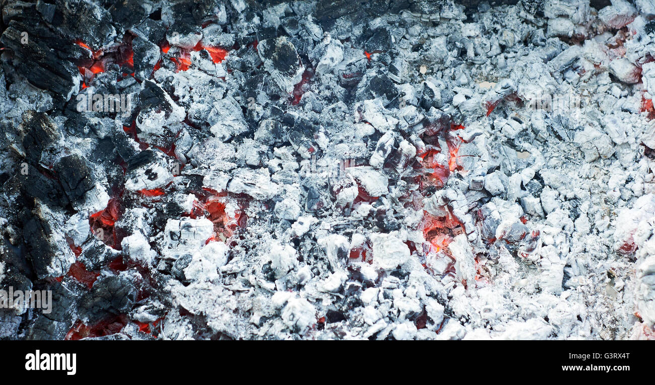 background of red smoldering charcoal under white ash Stock Photo - Alamy