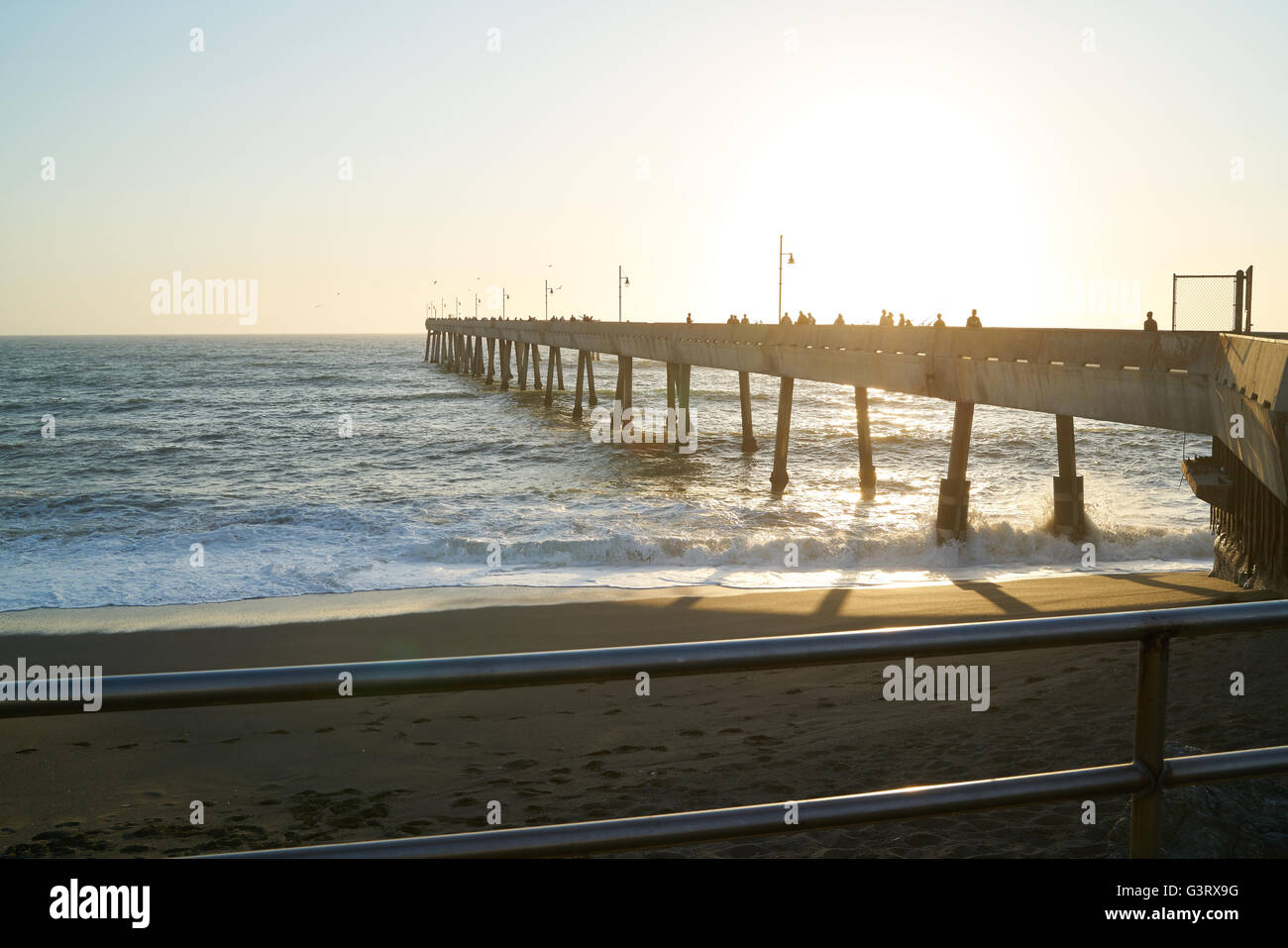 Ocean Pier at Sunset Stock Photo - Alamy