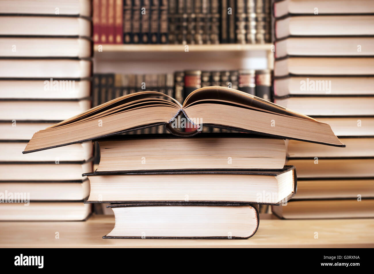 a stack of books in the library Stock Photo - Alamy