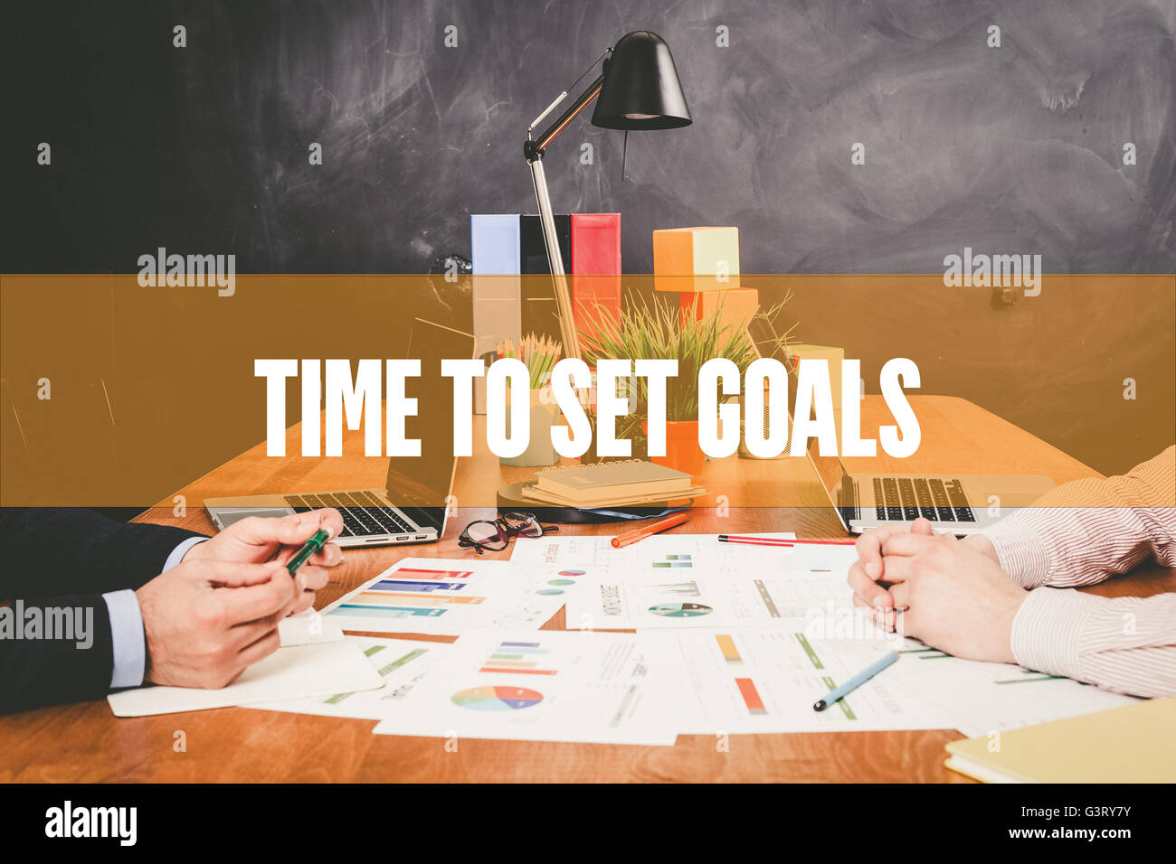 Two Businessman Time To Set Goals working in an office Stock Photo - Alamy