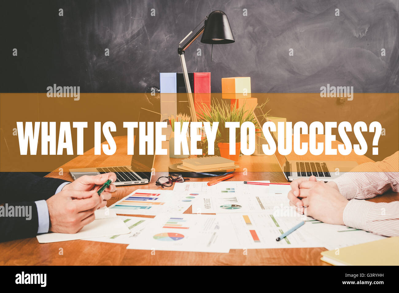 Two Businessman What Is The Key To Success? working in an office Stock ...