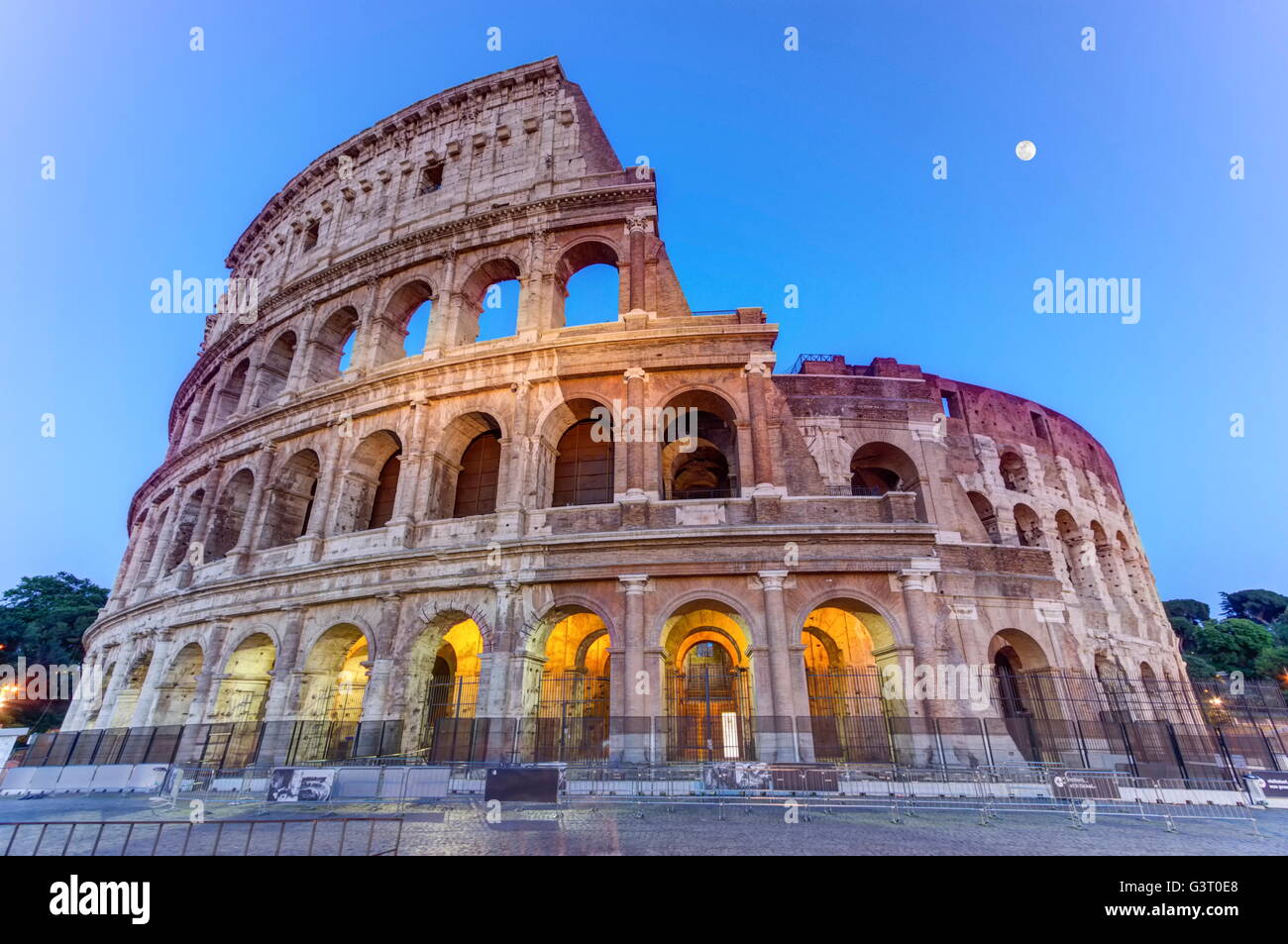 Coliseum by night with full moon in Roma, Italy Stock Photo - Alamy