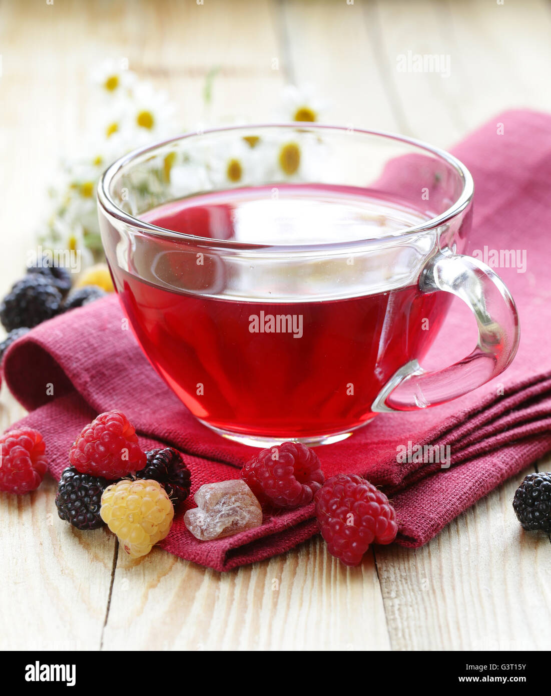 berry fruit tea in a glass cup Stock Photo - Alamy