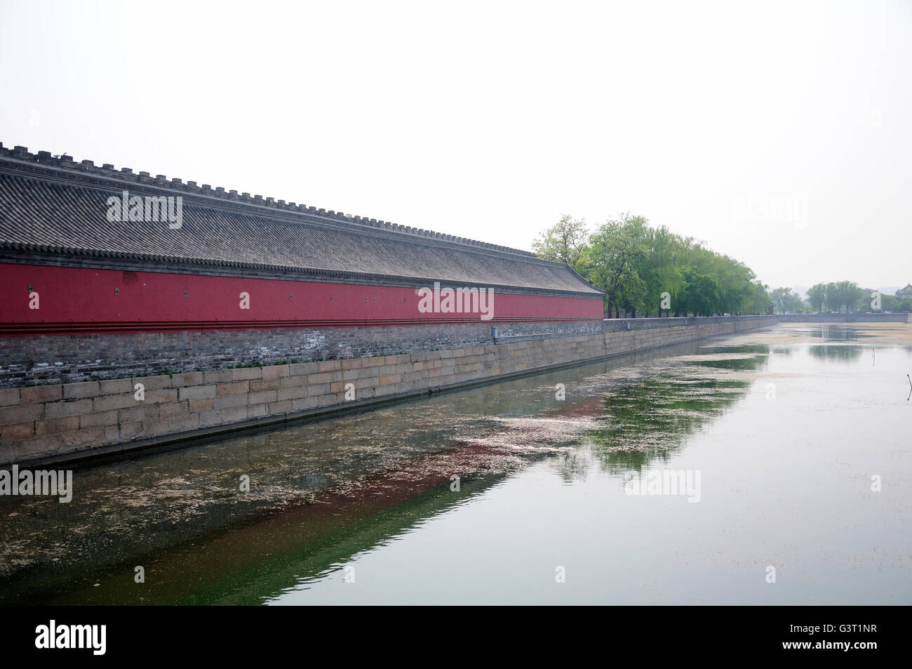 The outside moat and wall of the forbidden city in Beijing China on an ...