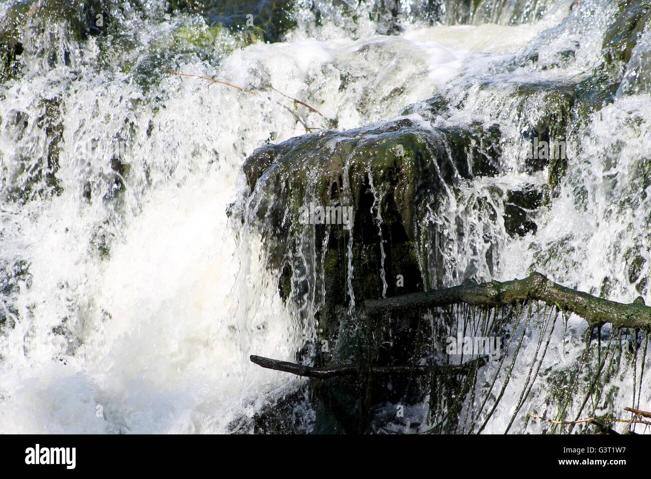 water falling over rocks Stock Photo - Alamy