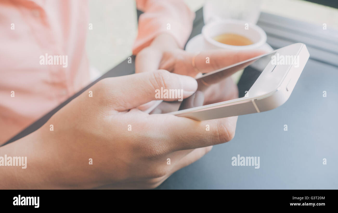 leisure, technology, lifestyle and people concept - close up of hand ...