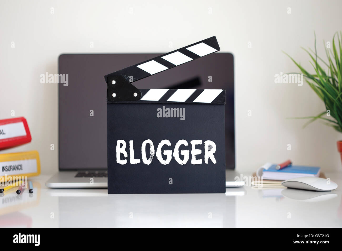 Cinema Clapper with Blogger word Stock Photo - Alamy