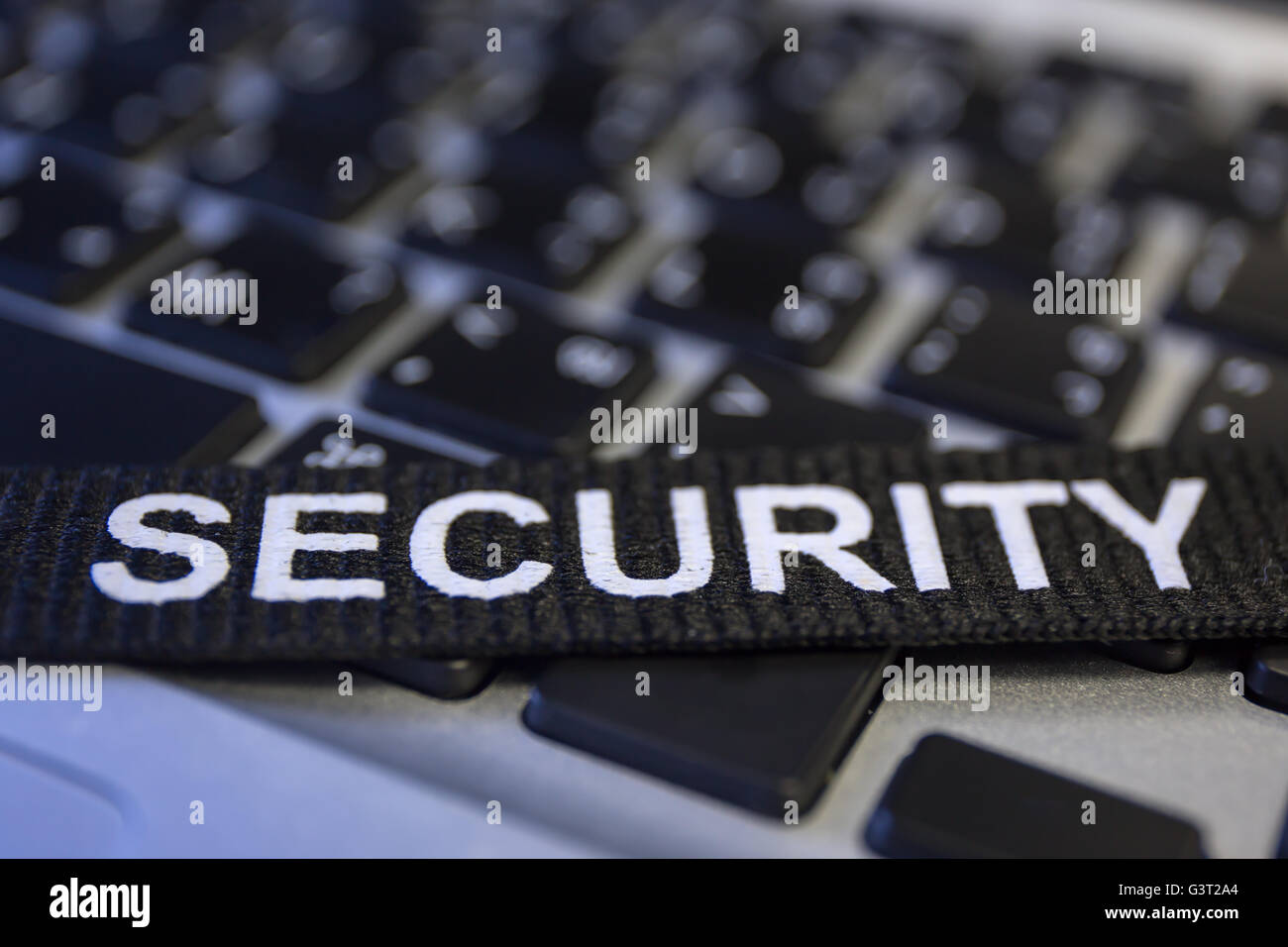 word security on labtop keyboard symbolized fraud and cyber crime ...