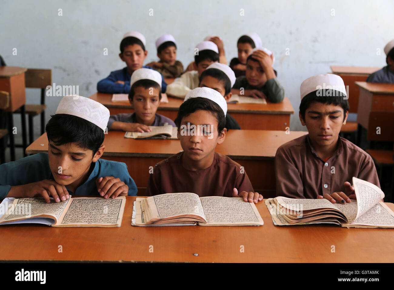 Muslim Boys In School Quran High Resolution Stock Photography and ...