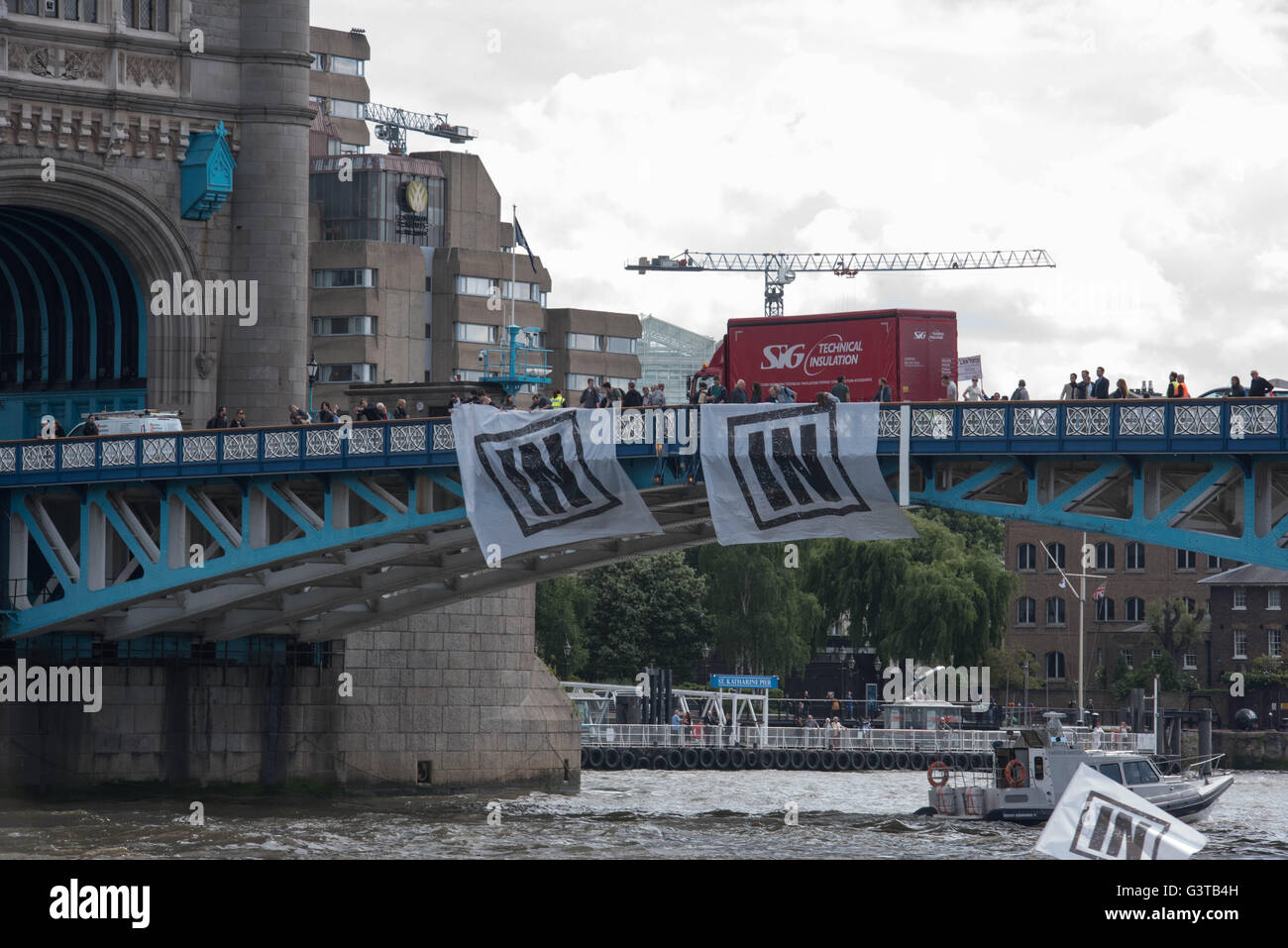 London, UK. 15th June, 2016. Remain in banners flown from Tower Bridge ...