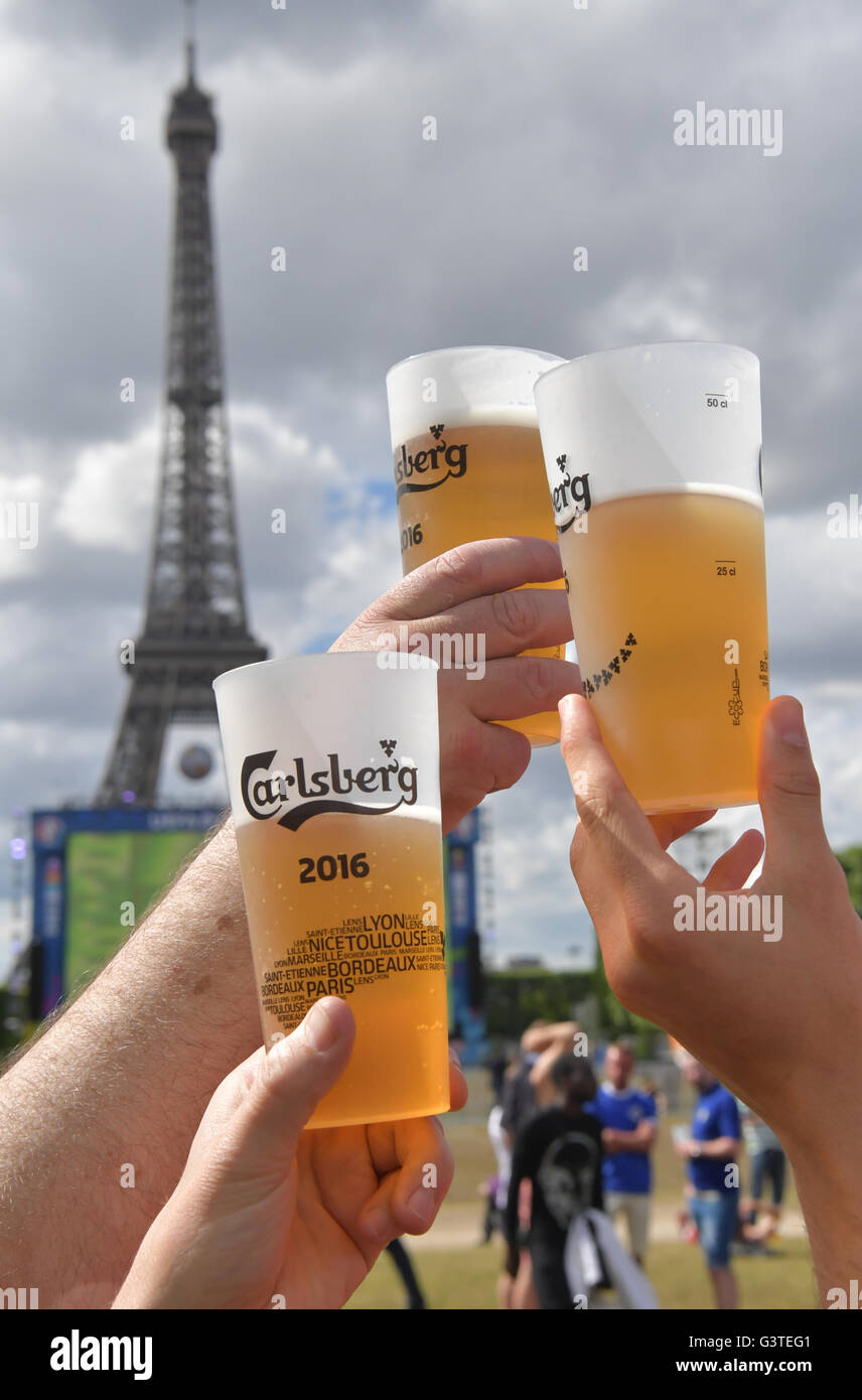 Paris, France. 15th June, 2016. Soccer fans toast with their plastic ...