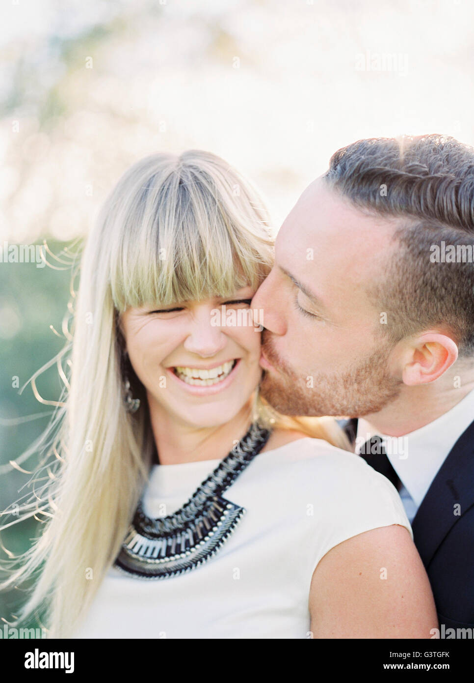 Bride and groom kissing on wedding day hi-res stock photography and ...