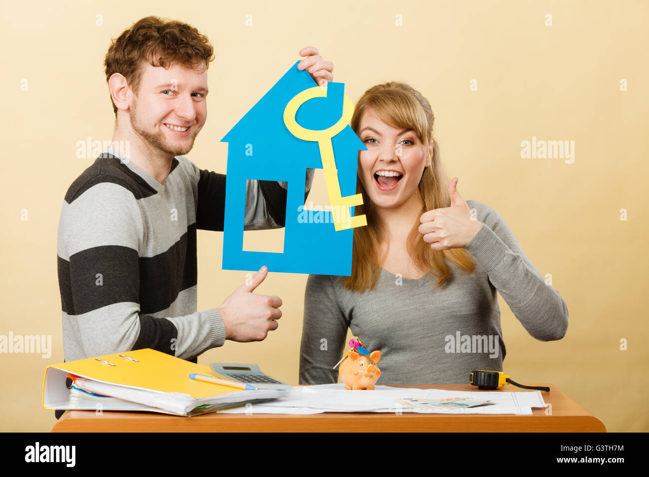 Project and design concept. Couple young marriage with model of their ...