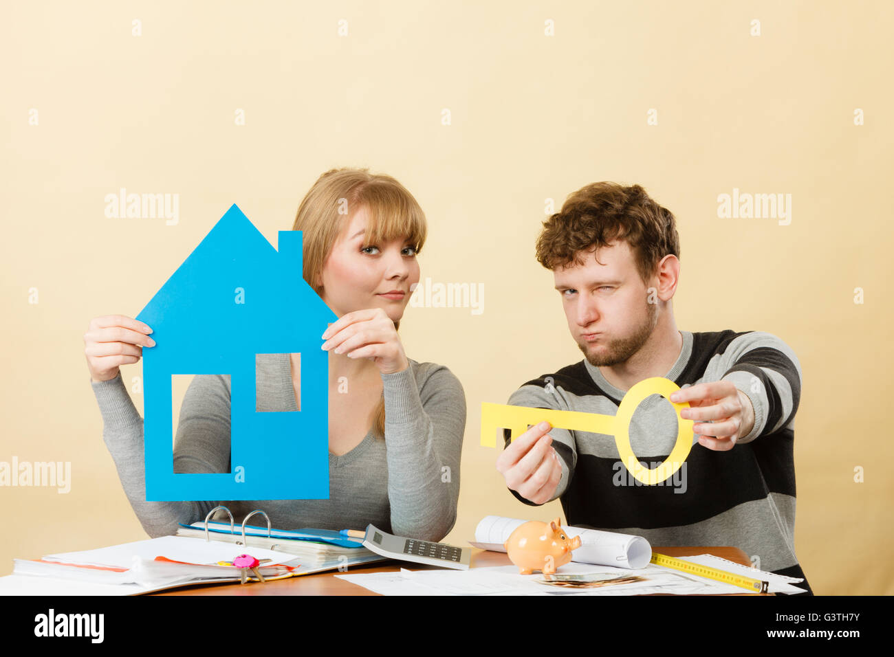 Project and design concept. Couple young marriage with model of their ...