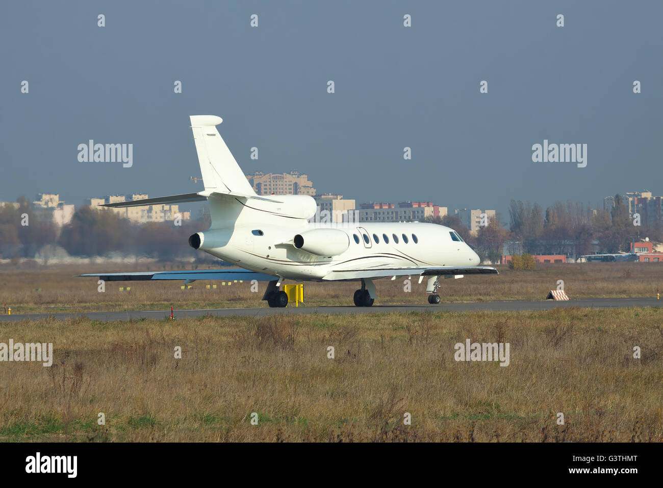 Private business jet plane is taking off from the airport Stock Photo ...