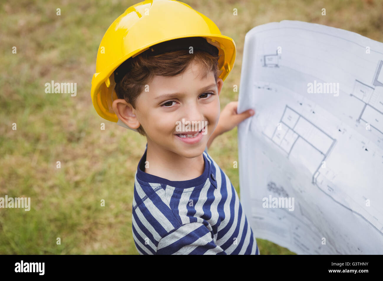 Little boy pretending to be architect Stock Photo - Alamy