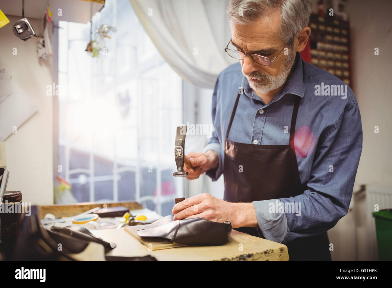 Shoe making machine hi-res stock photography and images - Alamy
