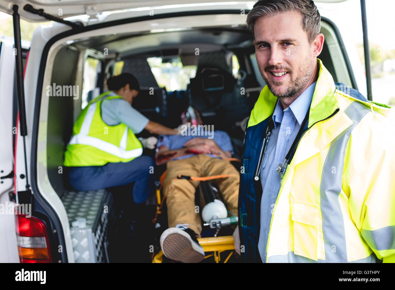 Portrait of ambulance man Stock Photo - Alamy