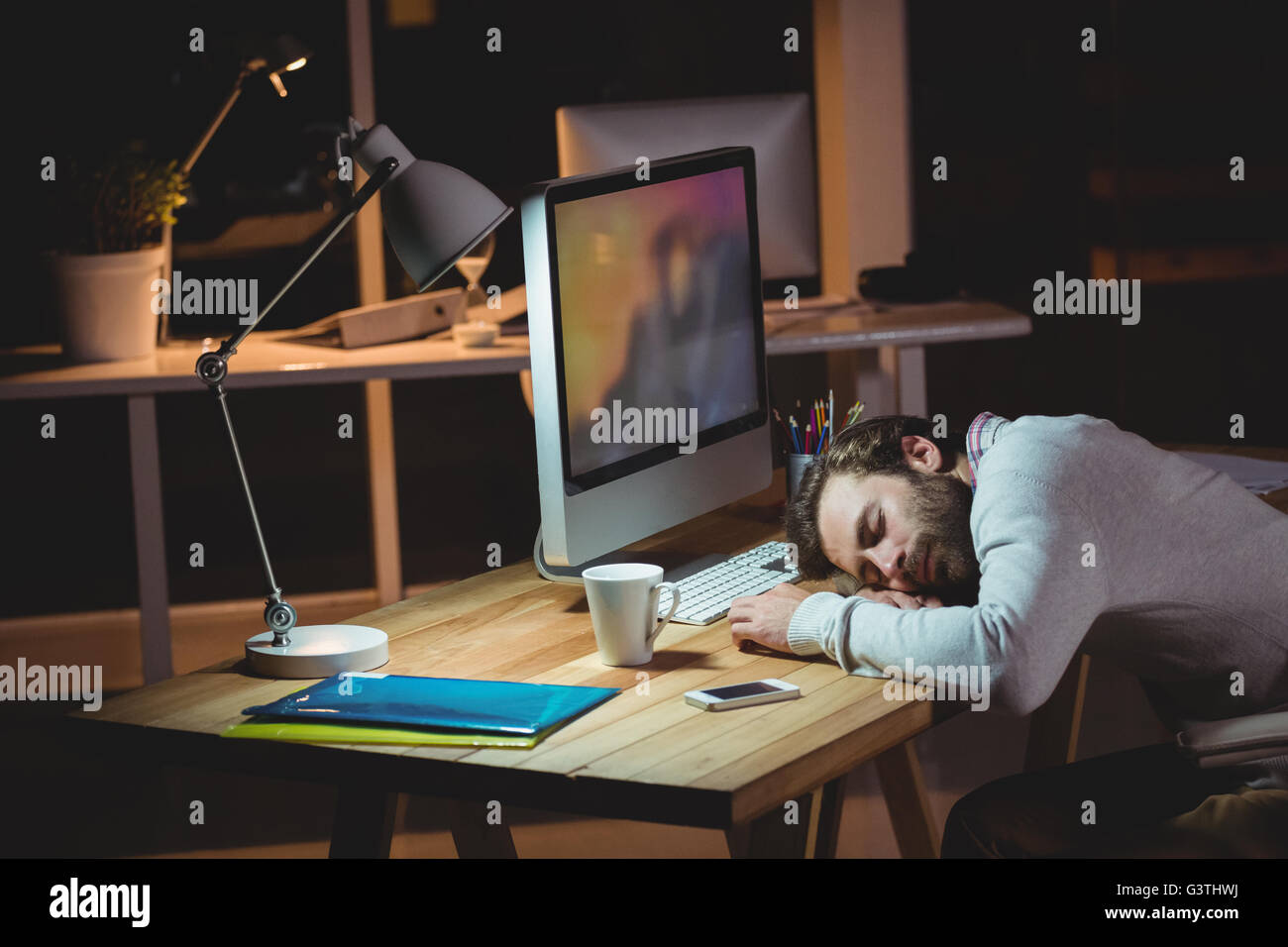 Sleeping in the workplace hi-res stock photography and images - Alamy