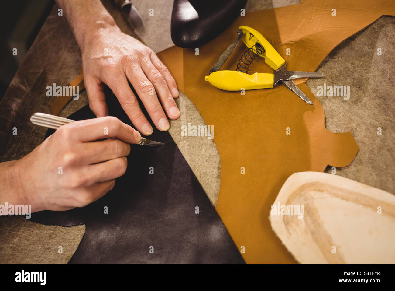High angle view of hands with blade Stock Photo - Alamy