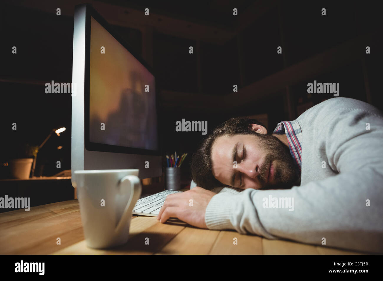 Man sleeping on his desk Stock Photo - Alamy