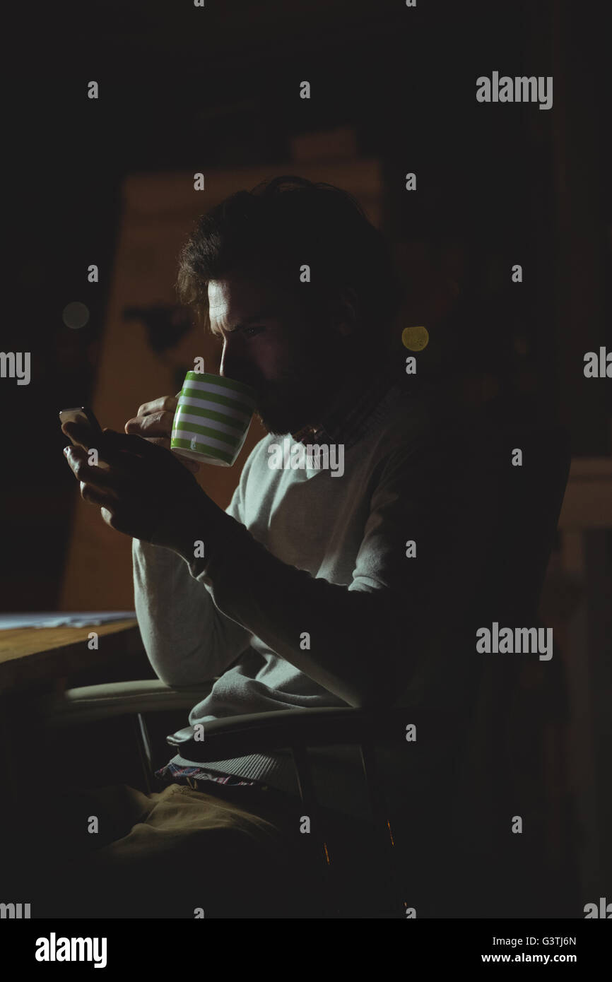 Looking at smartphone night hi-res stock photography and images - Alamy