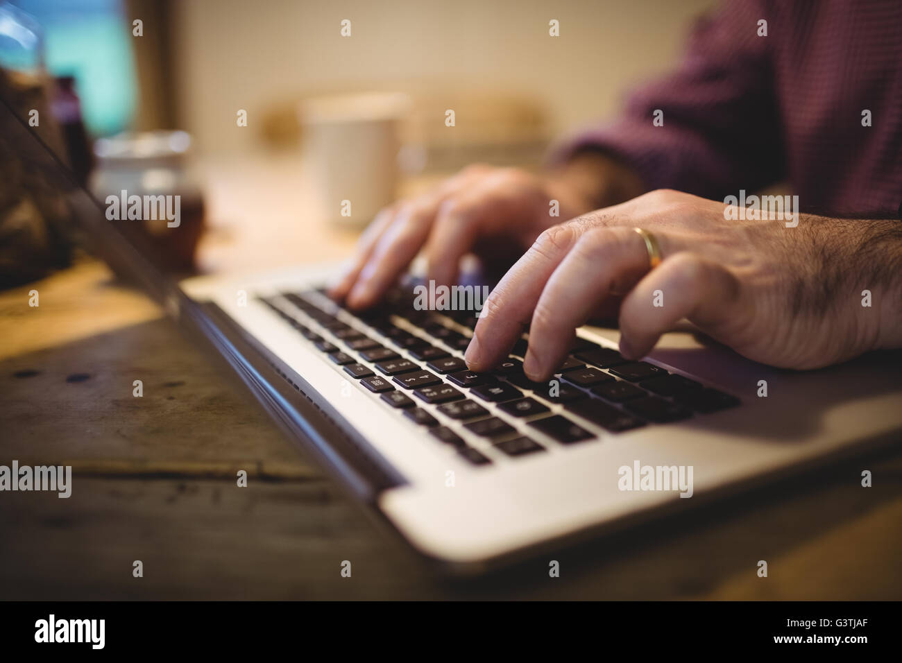 Mature adult man typing hi-res stock photography and images - Alamy