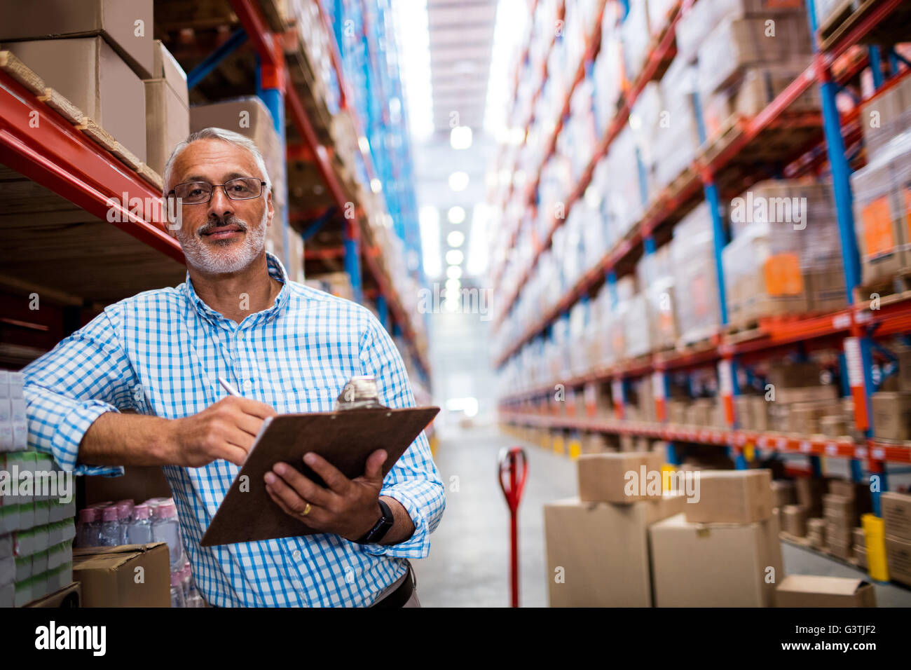 Man posing with his clipboard Stock Photo - Alamy