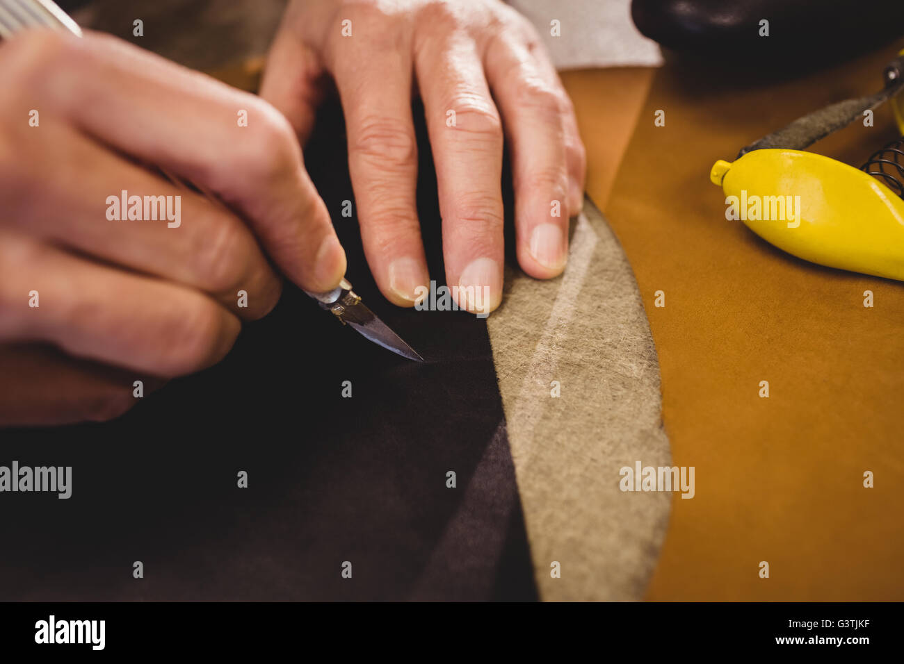 Close up of hands with a blade Stock Photo - Alamy