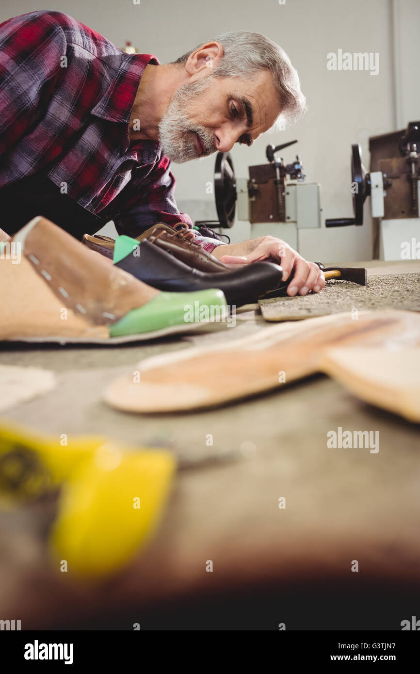 Man and cobbler hi-res stock photography and images - Alamy