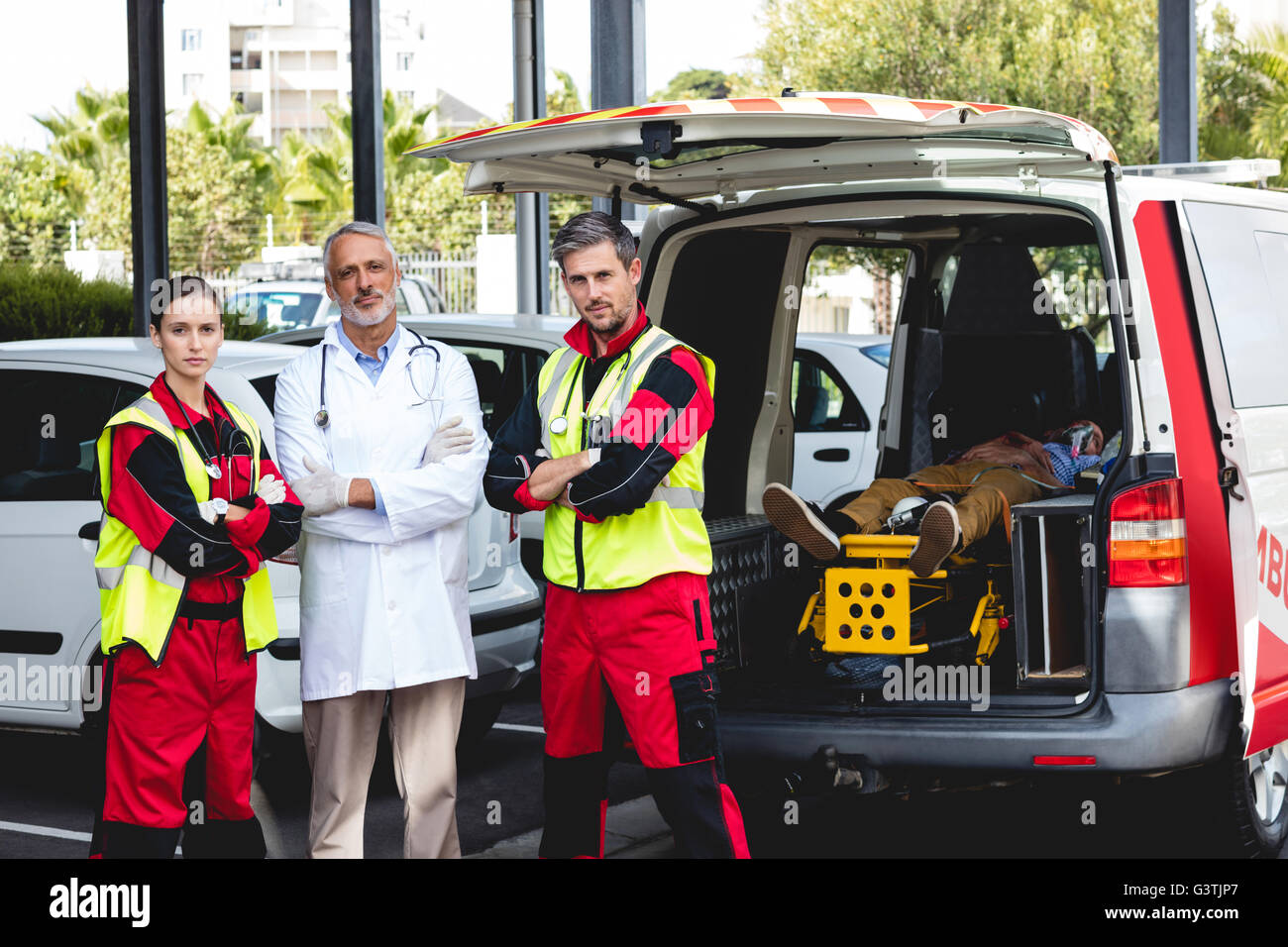 Portrait of ambulance men Stock Photo - Alamy