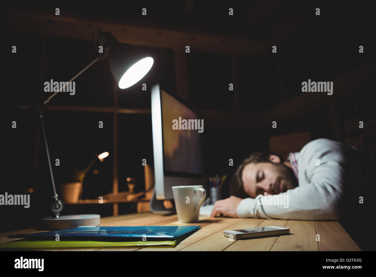 Man sleeping on his desk Stock Photo - Alamy
