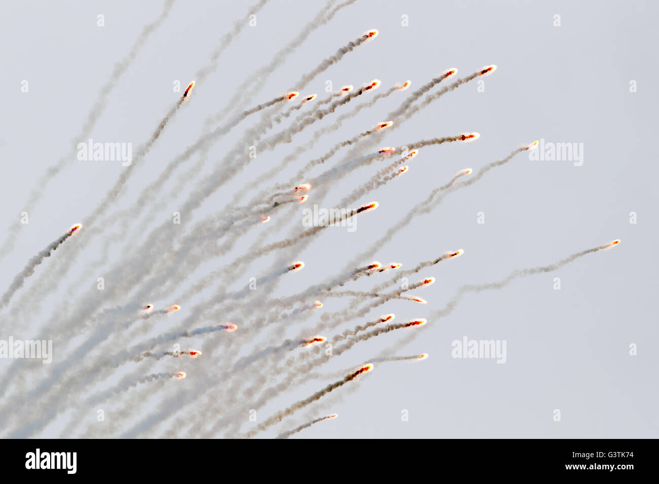 Flares fired from a fast moving jet Stock Photo - Alamy