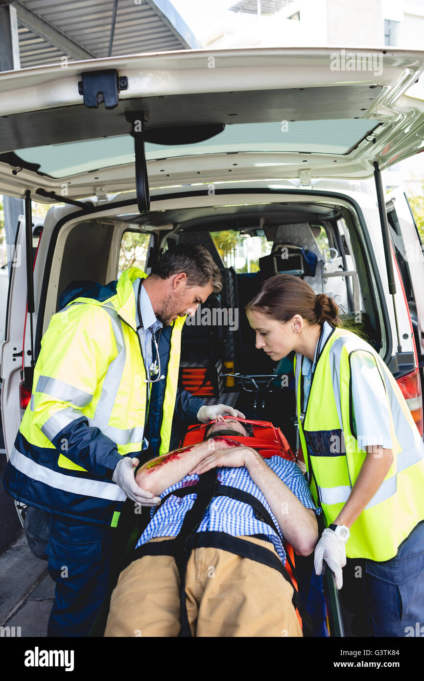 Man on stretcher accident hi-res stock photography and images - Alamy