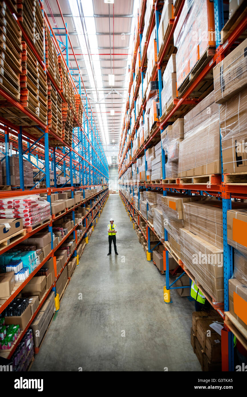 Portrait of a warehouse manager in an aisle Stock Photo - Alamy