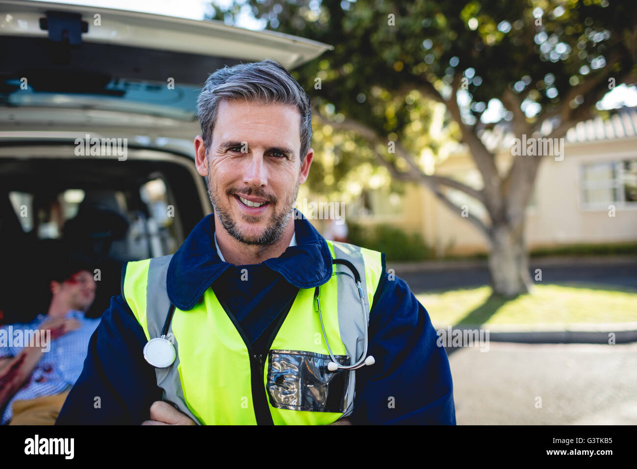 Portrait of ambulance man Stock Photo - Alamy