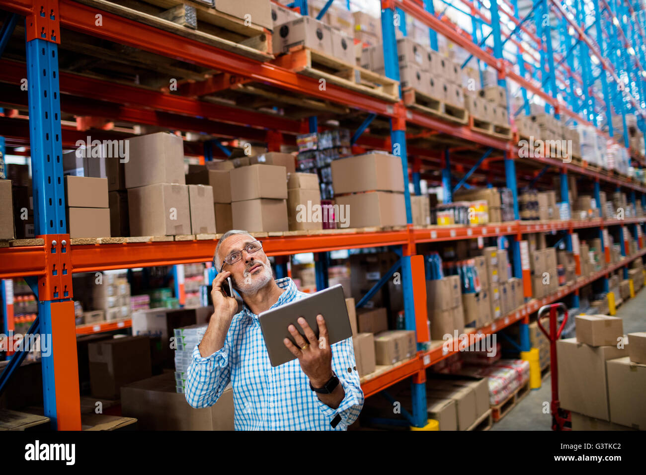 Manager using technology Stock Photo - Alamy