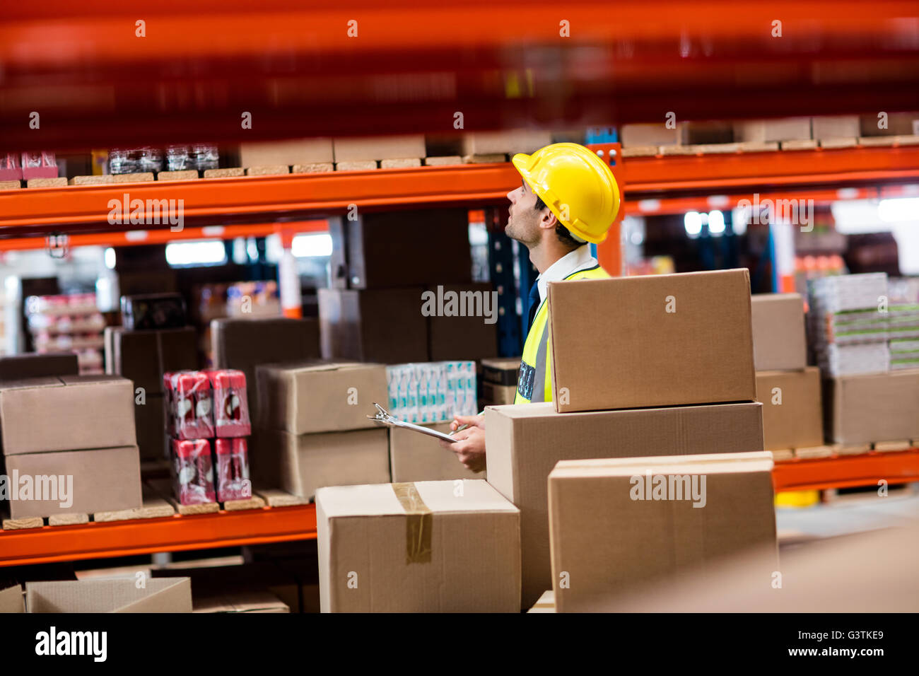 Businessman logistics checking inventory hi-res stock photography and ...