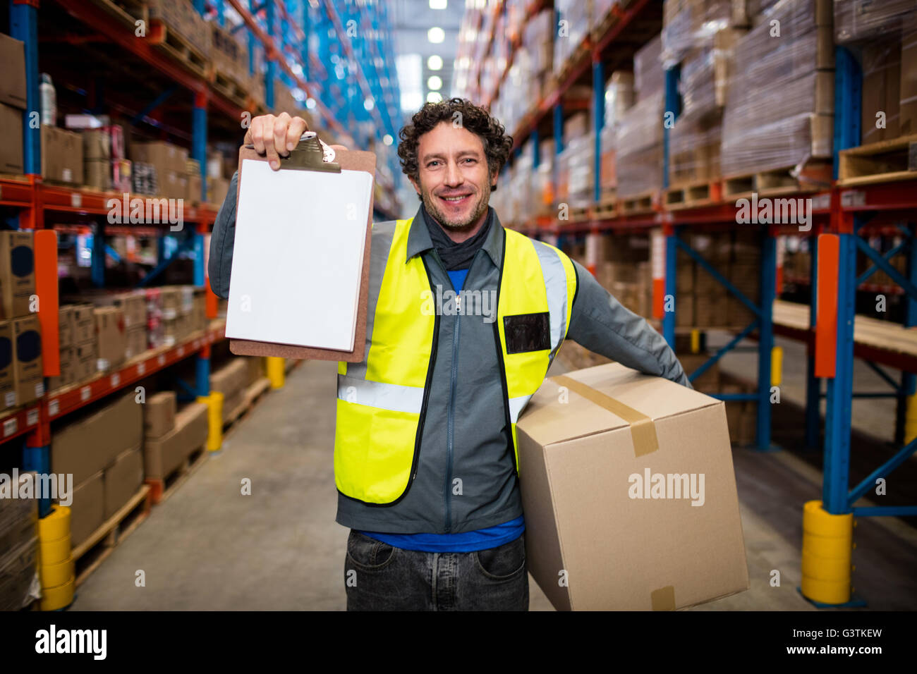Portrait of a warehouse worker Stock Photo - Alamy
