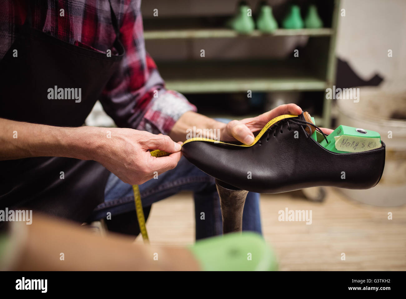 Cobbler shoe repair hi-res stock photography and images - Alamy