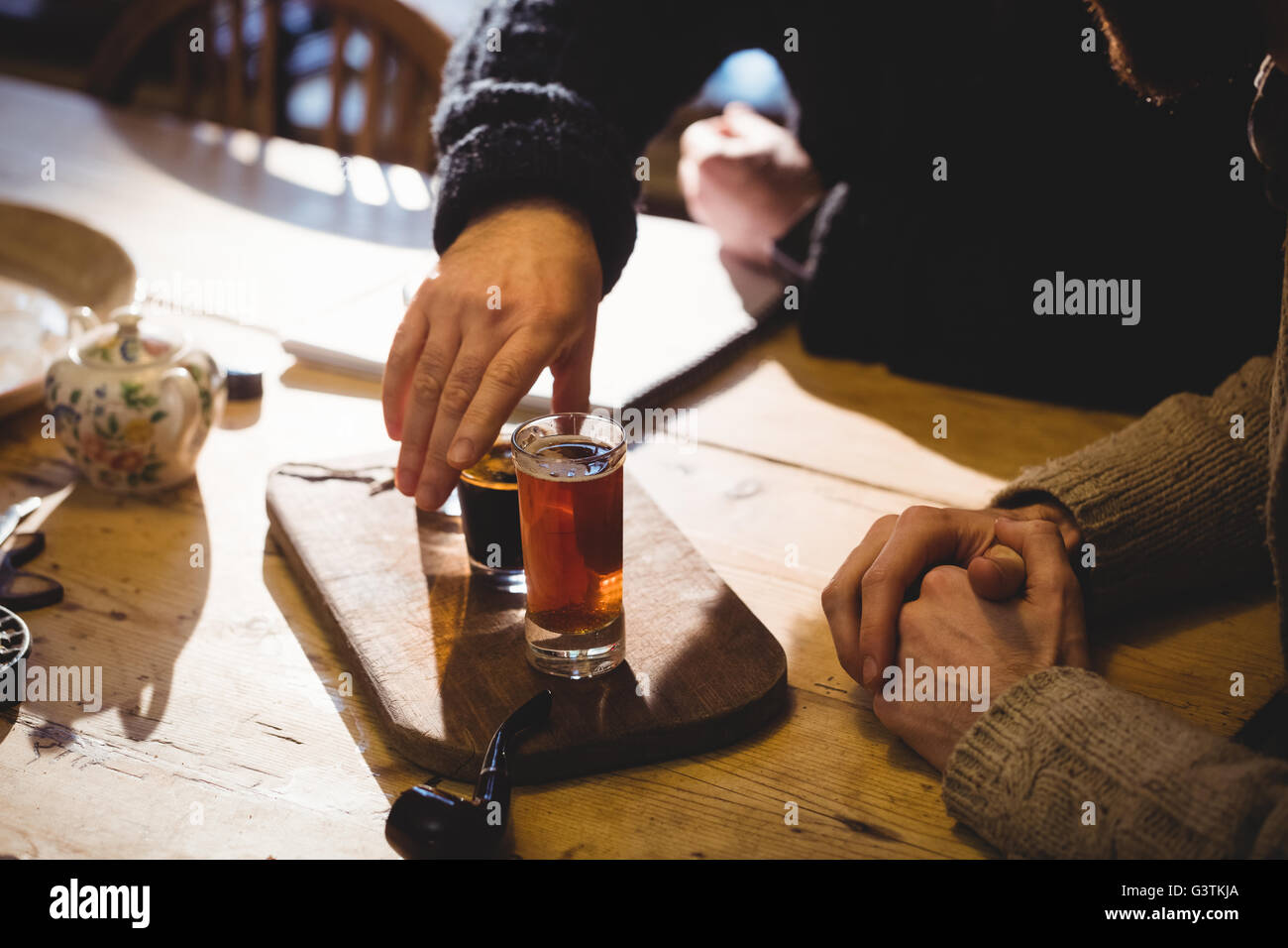 Man with shot glasses hi-res stock photography and images - Alamy