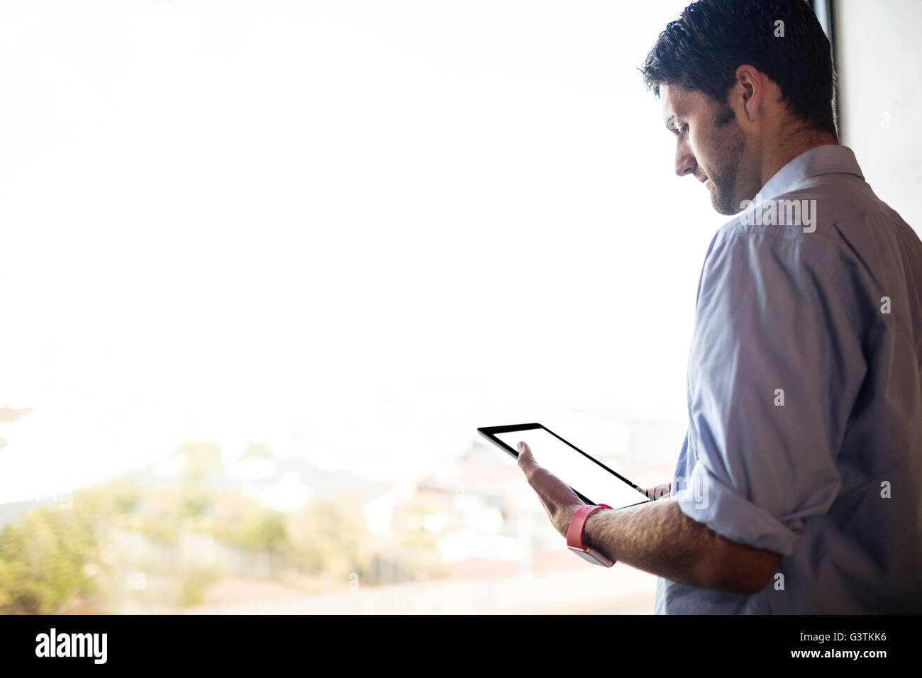 Rear view caucasian businessman using hi-res stock photography and ...