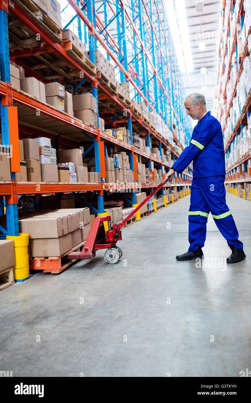 Worker pushing hi-res stock photography and images - Alamy