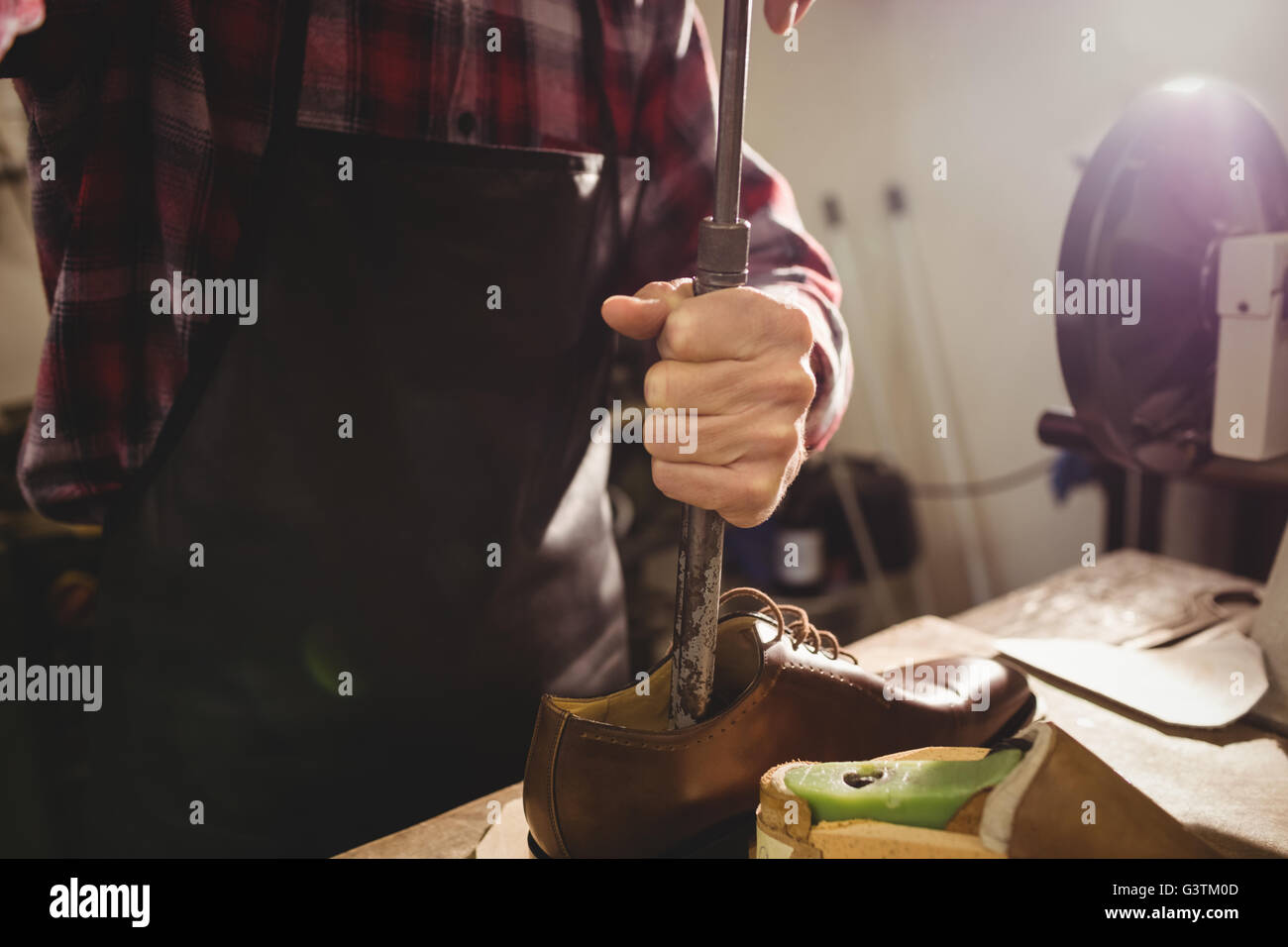 Close up of cobbler making shoes Stock Photo - Alamy