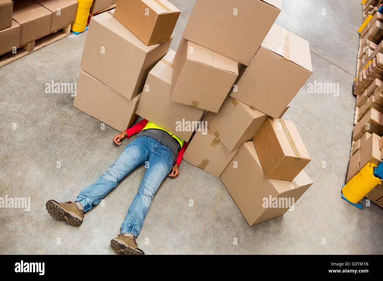 Worker lying on the floor Stock Photo - Alamy