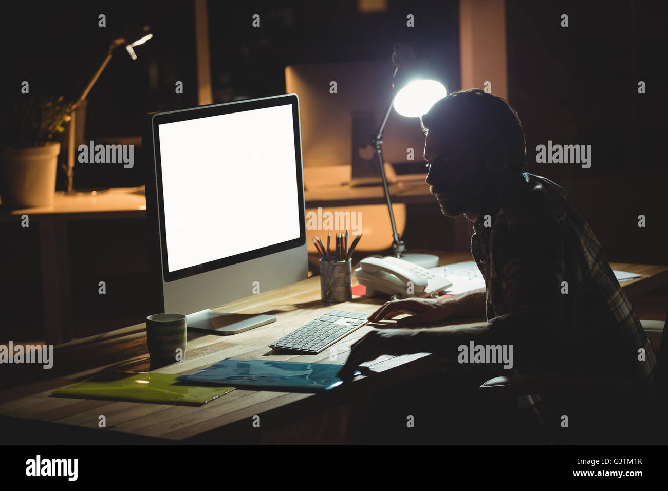 Using computer business night hi-res stock photography and images - Alamy